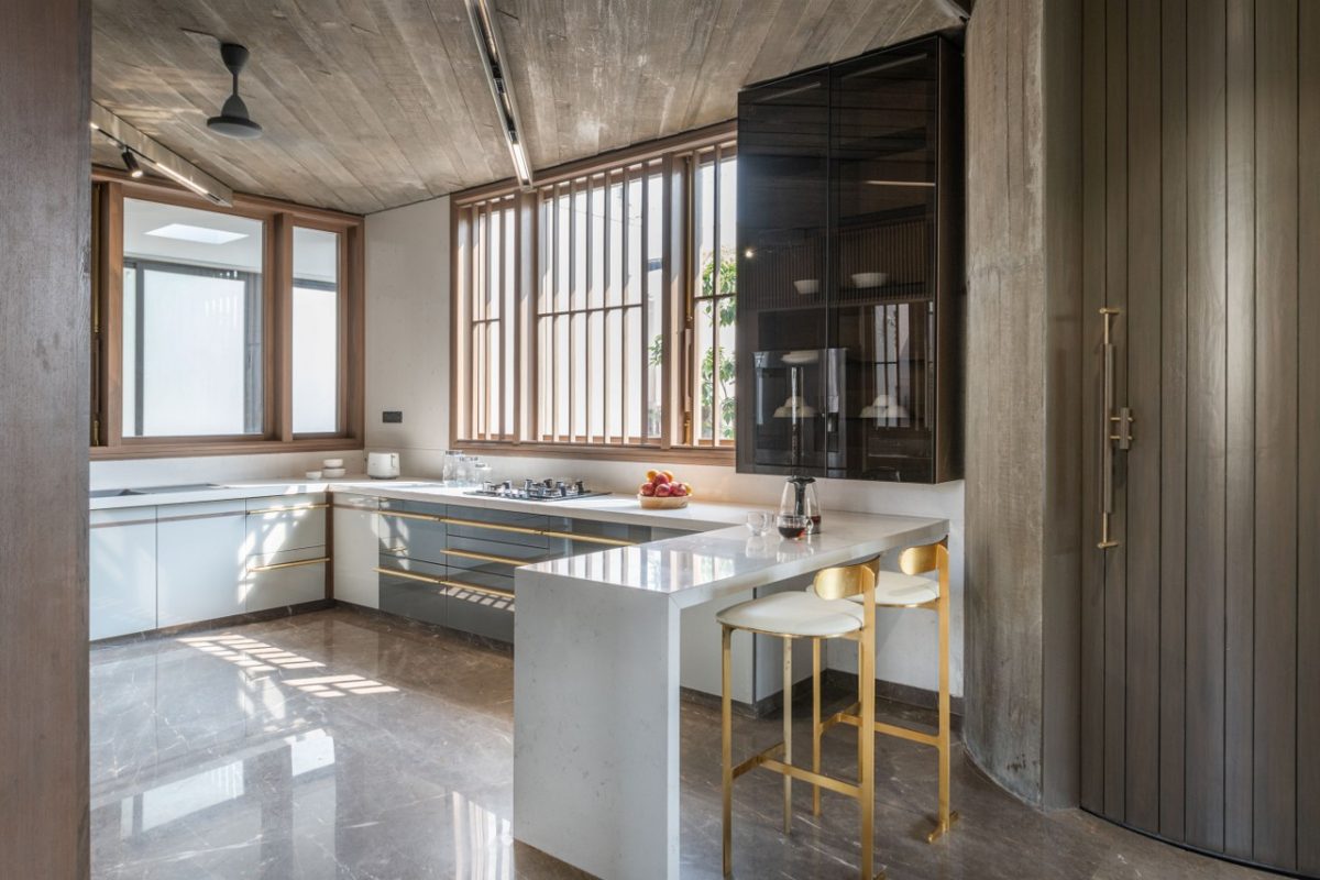 The Residence Features An Exposed Brick Design That Enhances Its Street ...