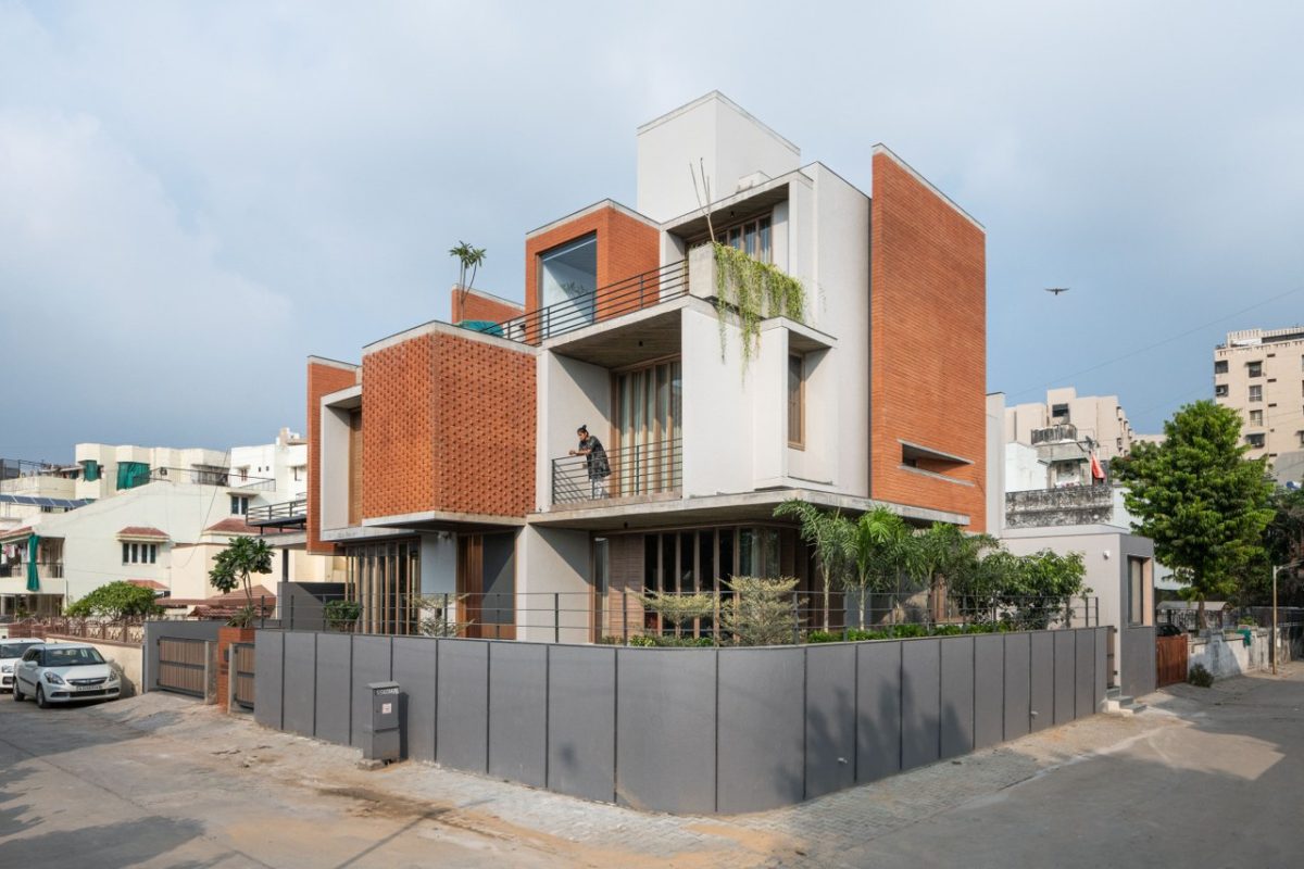 The Residence Features An Exposed Brick Design That Enhances Its Street ...