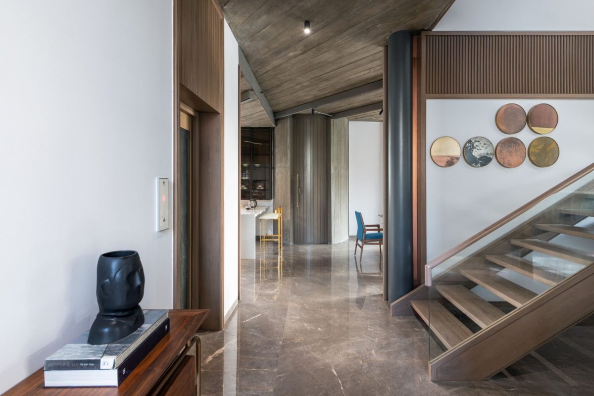 The Residence Features An Exposed Brick Design That Enhances Its Street ...