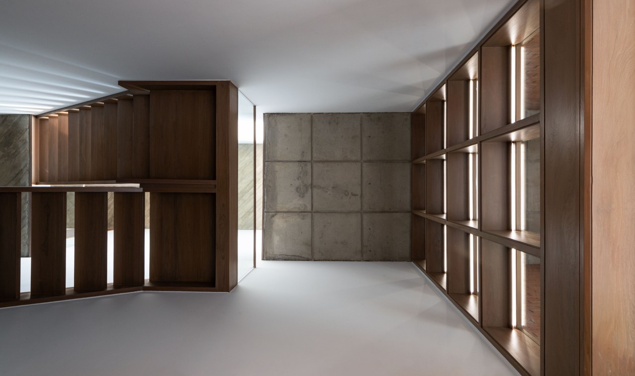 The Residence Features An Exposed Brick Design That Enhances Its Street ...