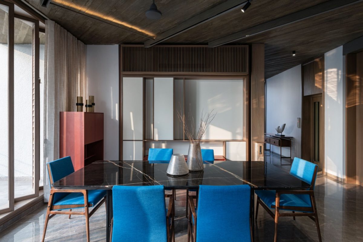 The Residence Features An Exposed Brick Design That Enhances Its Street ...