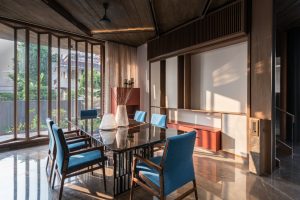 The Residence Features An Exposed Brick Design That Enhances Its Street ...