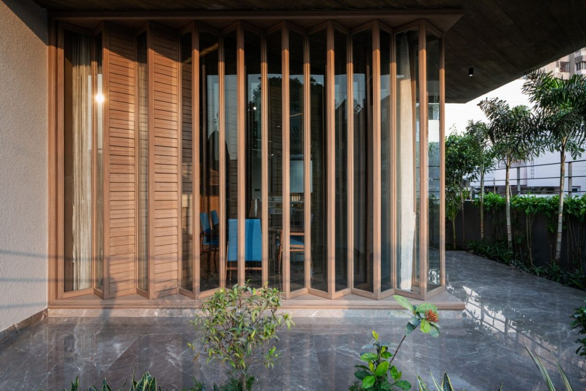 The Residence Features An Exposed Brick Design That Enhances Its Street ...