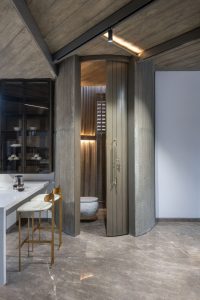 The Residence Features An Exposed Brick Design That Enhances Its Street ...