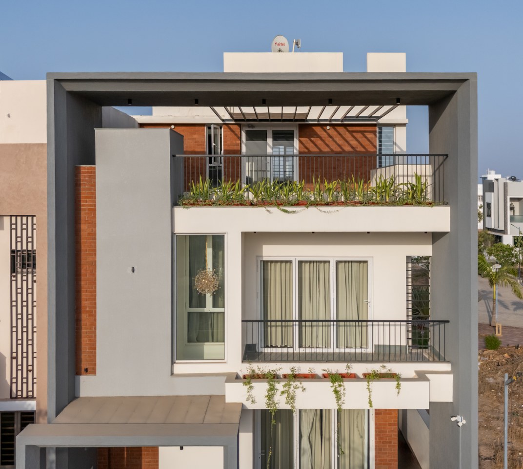 This Open Plan House Design Embraces Modesty | Flamingo Architects