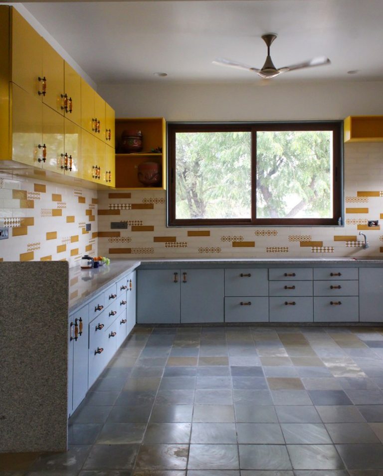 This Farmhouse Embraces Filler Slab Design with Terracotta Pots ...