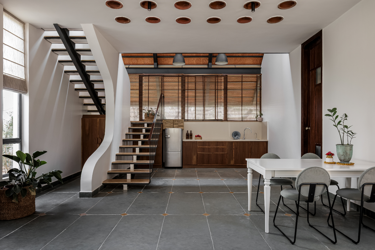 With Sculptural Steel Roof, This Guest House Design is Robust yet ...