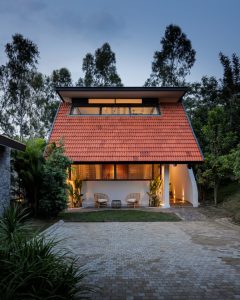 With Sculptural Steel Roof, This Guest House Design is Robust yet ...