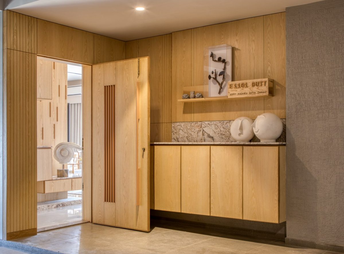This Apartment with Wood Interior Design Celebrates Intricate ...