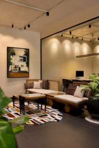 Urban Rhythms And Earthy Materials Transform This 3BHK Into a Modest ...
