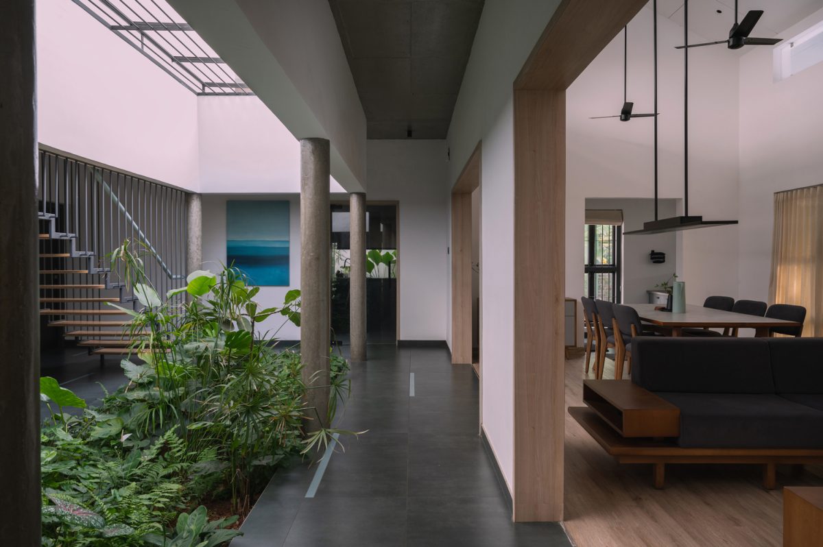 This Teal Color Coastal Home Is A Testament Of Traditional Forms And ...
